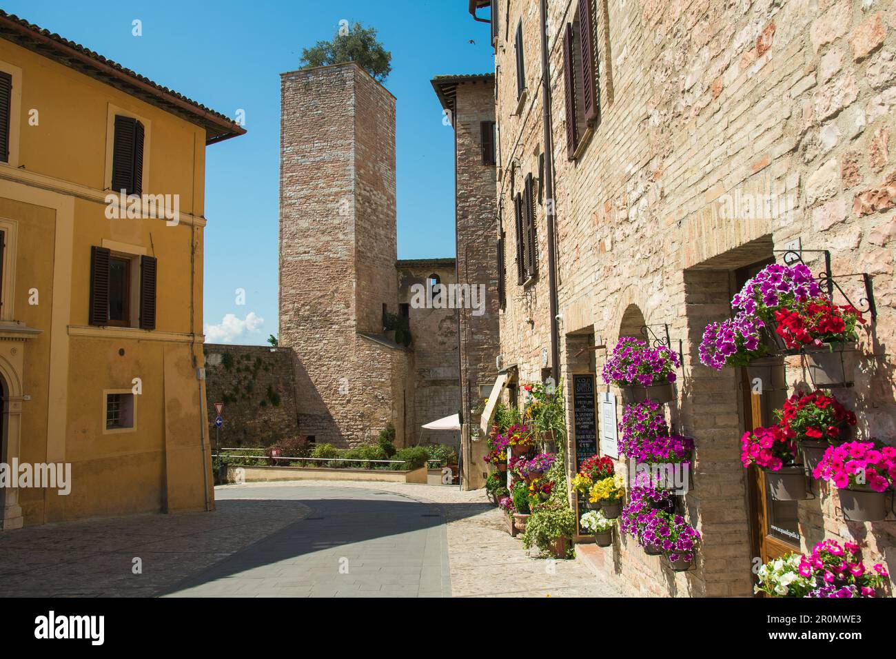 SPELLO, ITALY - MAY 9, 2023: View of tower in the center of Spello, the ...