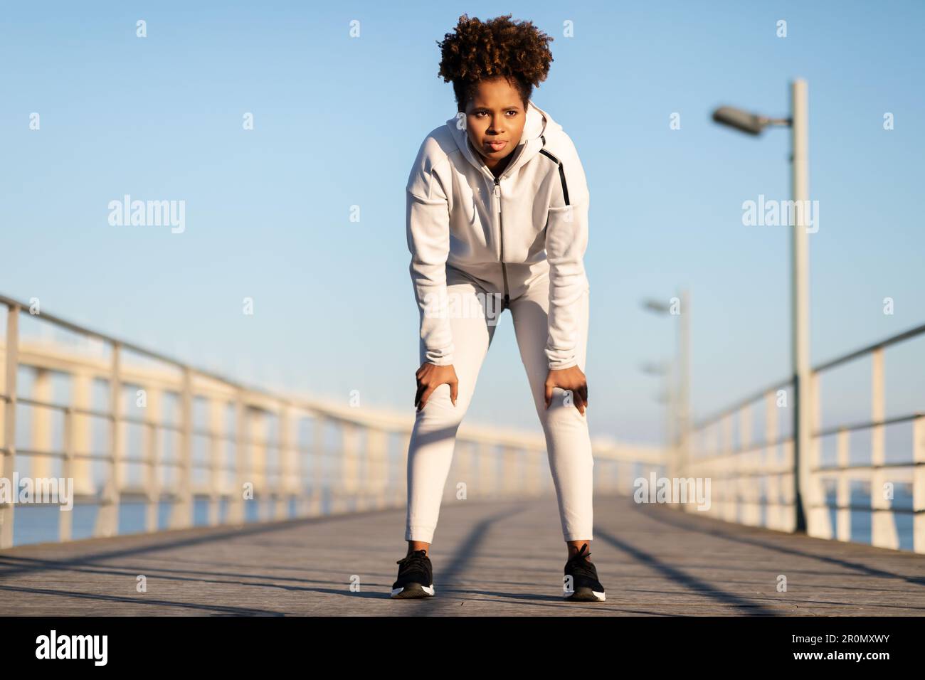 Portrait Of Tired Young Black Female Athlete Resting After Jogging ...