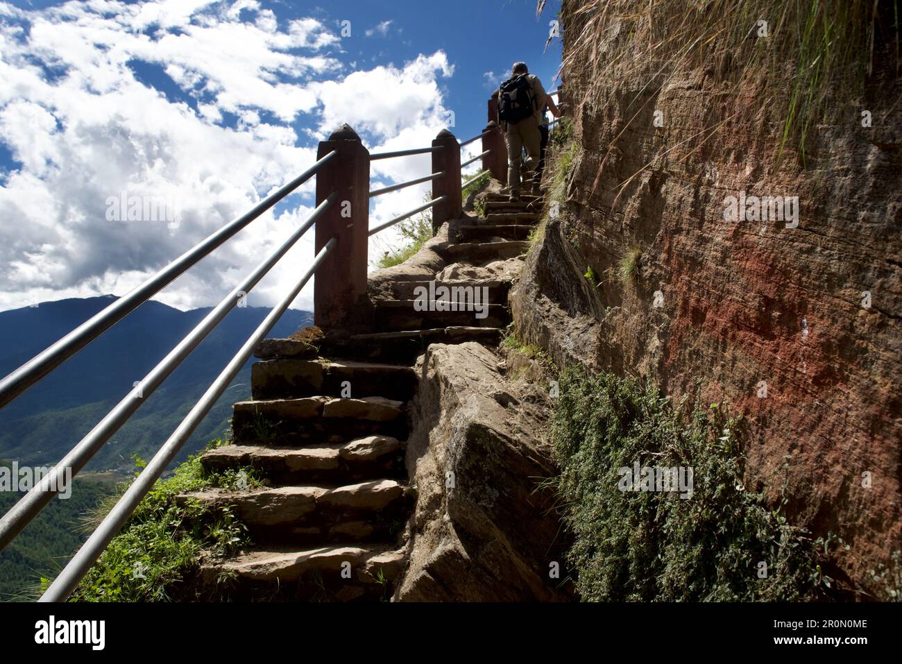 Stairs to the monastery Taktshang or Taktsang or Tigernest in a rock ...