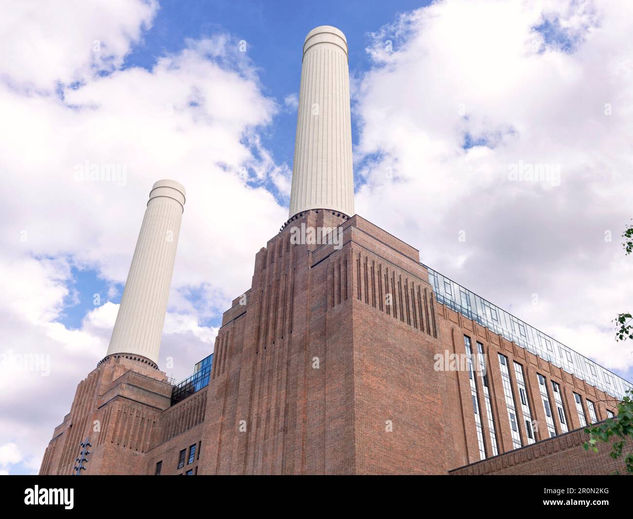 Detail of brick facade and iconic chimneys from below. Public Realm at ...