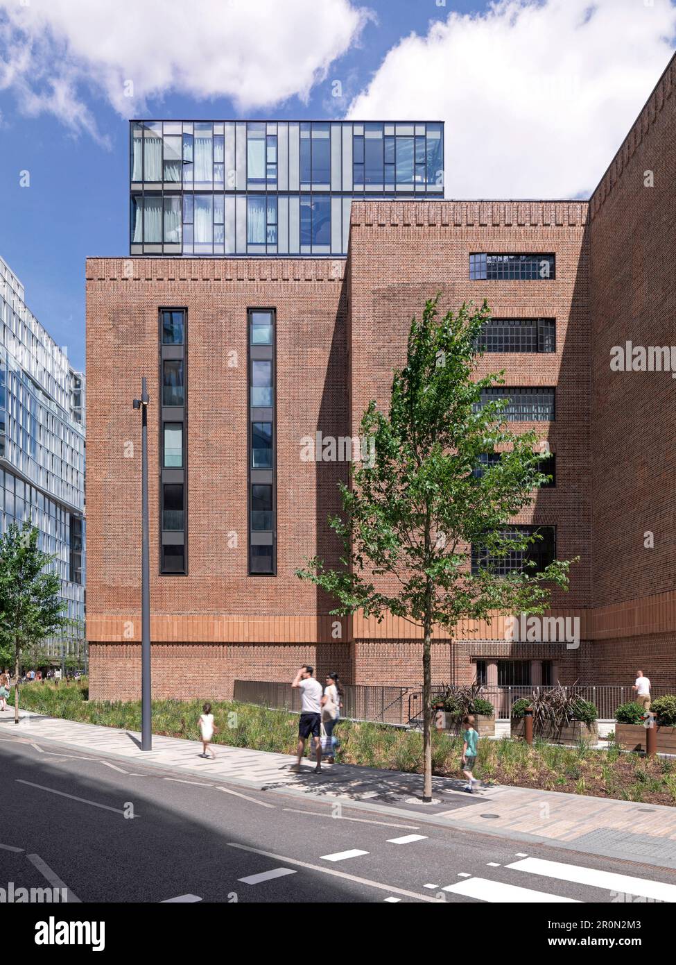 Walkways and refurbished brick facade of BPS. Public Realm at Battersea ...