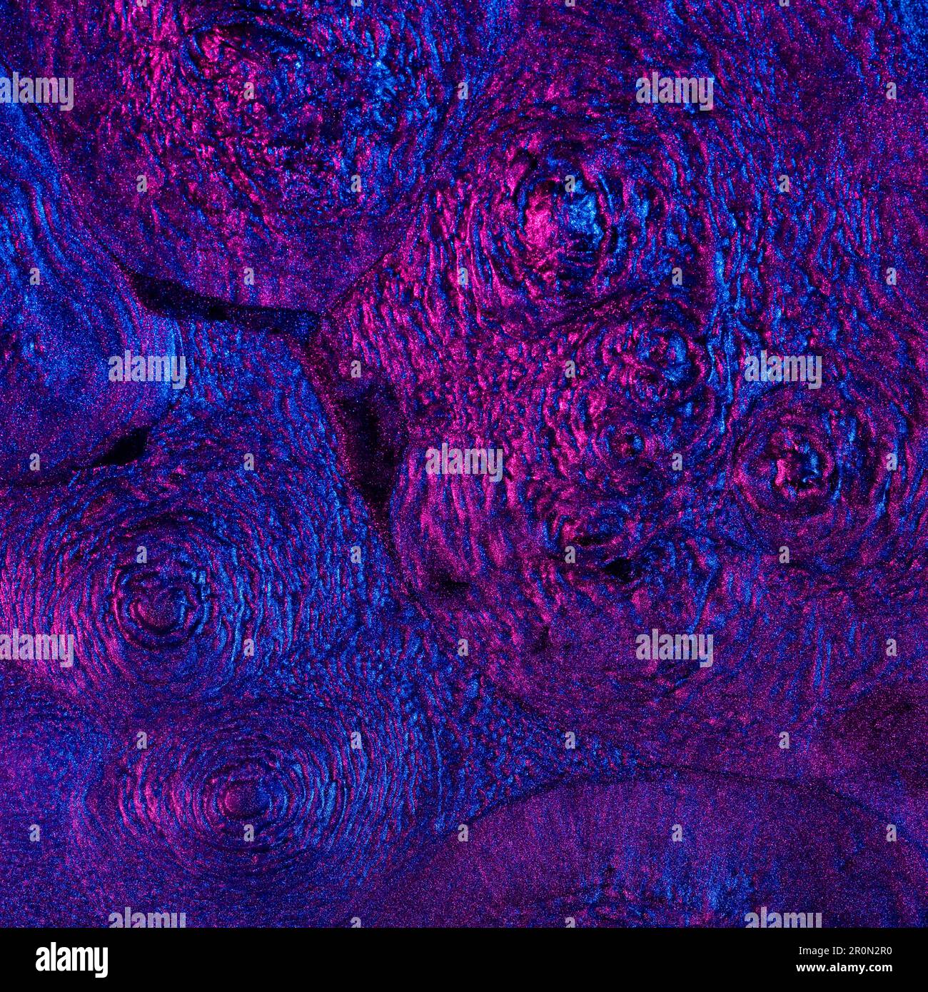 Ferrofluid illuminated with neon light Stock Photo - Alamy