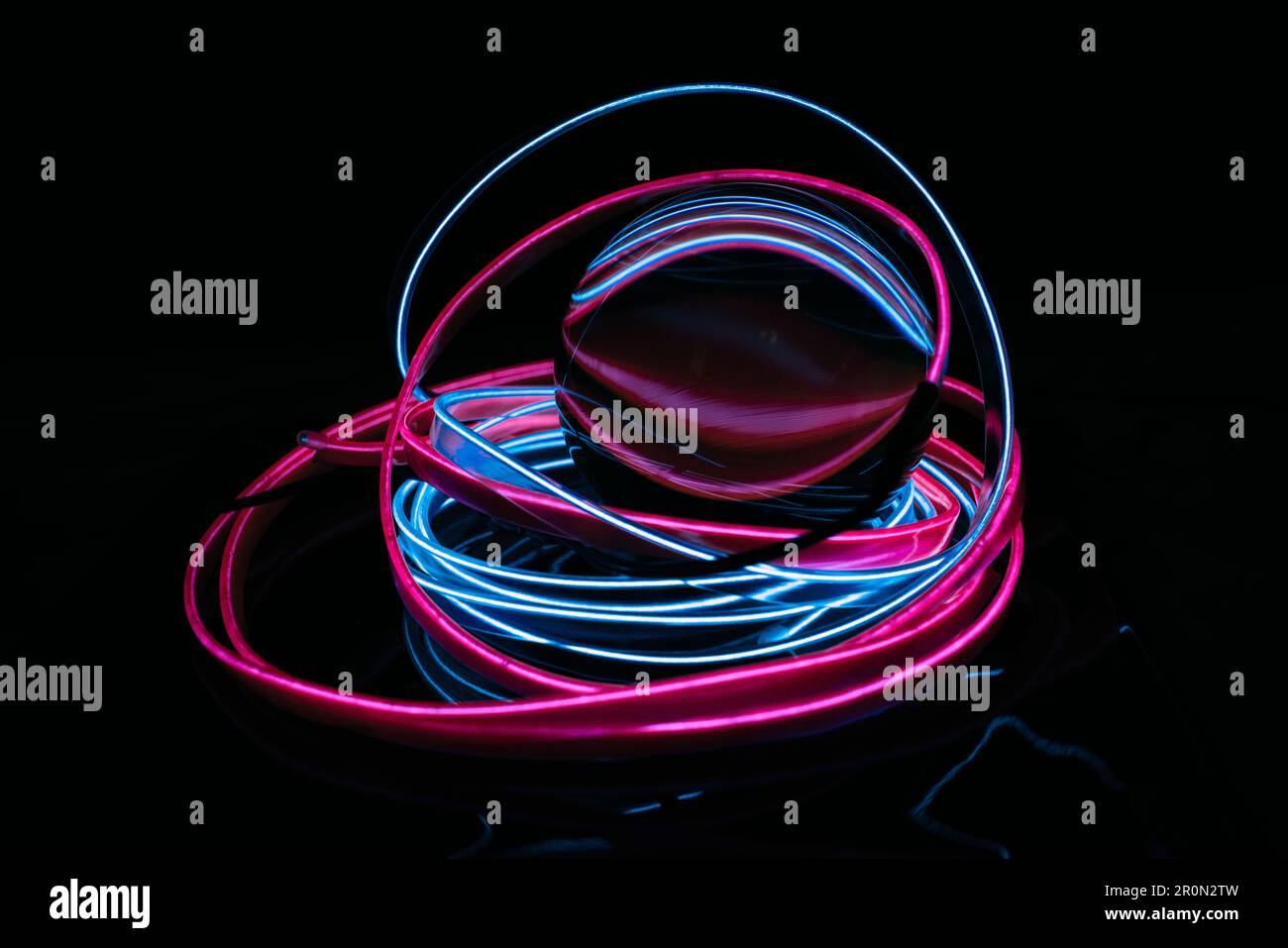 Neon ball wrapped in light hi-res stock photography and images - Alamy