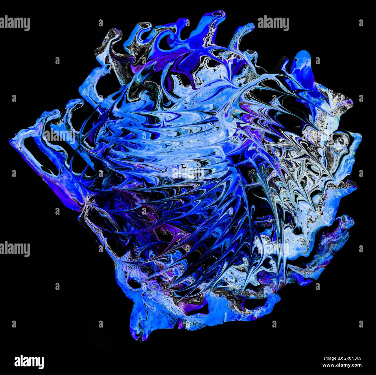 Close-up shot of thick paint of various bright colors flowing down and ...