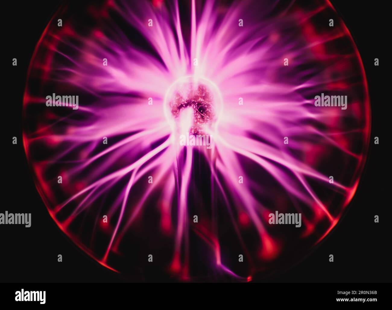 Abstract neuron shaped neon light pattern created by glowing plasma ...