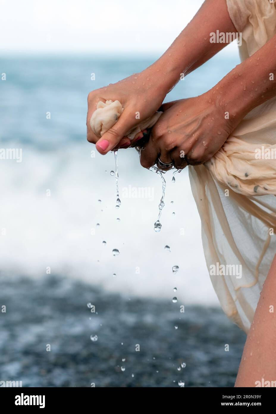 Wring out the cloth hi-res stock photography and images - Alamy