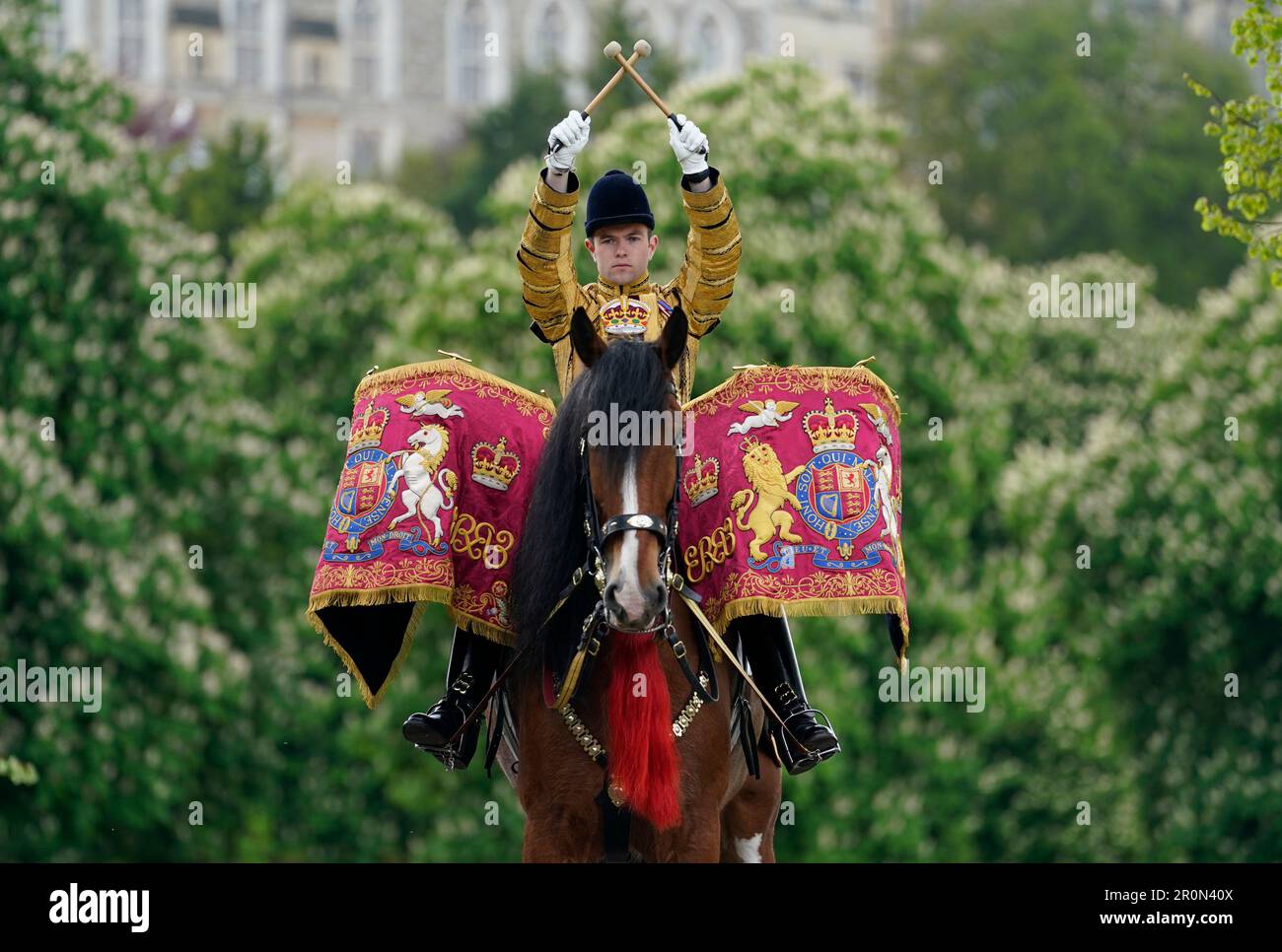 Lance Corporal Buswell from the Band of The Household Cavalry, riding ...