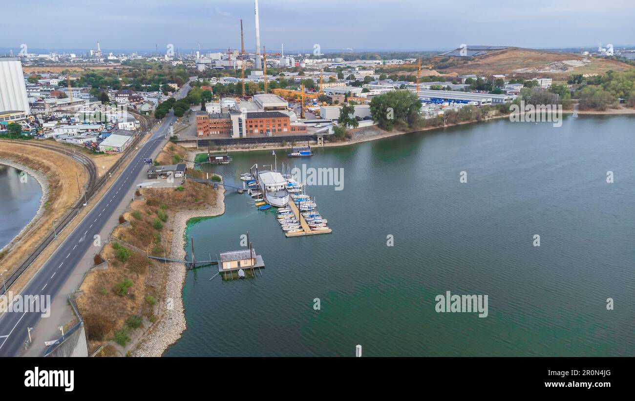 Aerial view of cityscape Mannheim surrounded by buildings and water ...