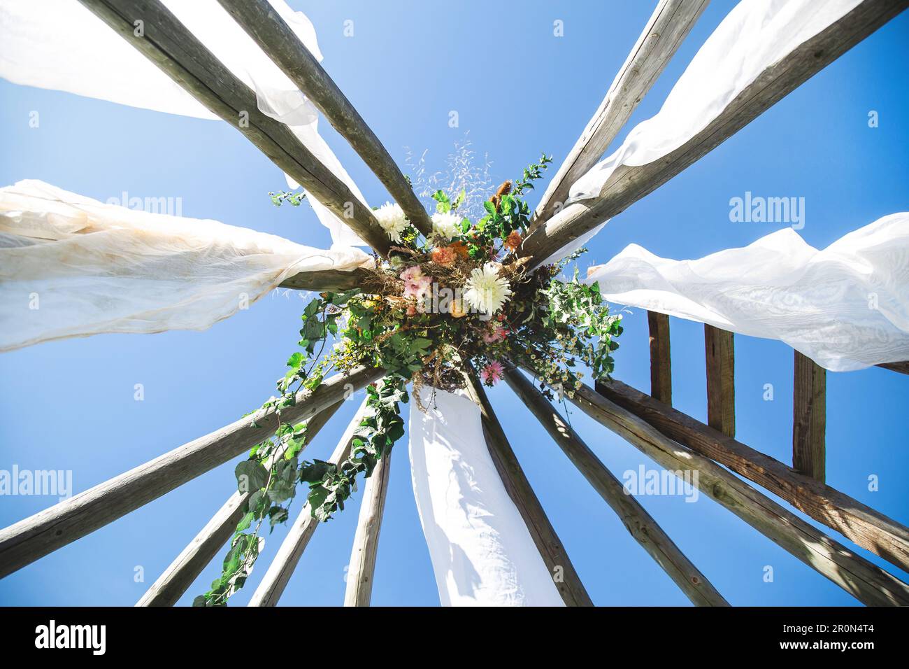 Rustic wedding decoration, ceremony arch with bohemian flowers, white ...