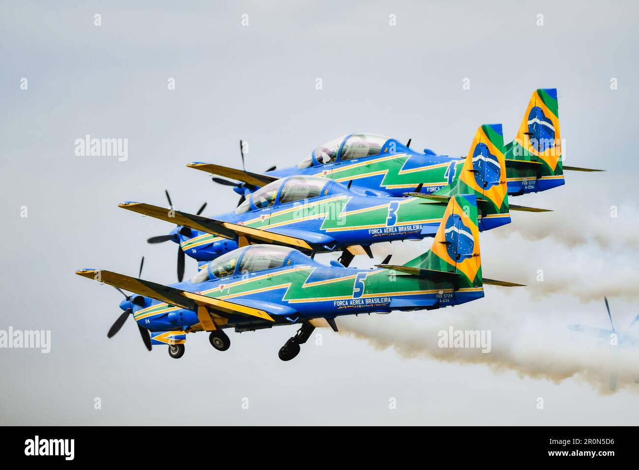 Spectacular airplanes soar through a bright blue sky, moving swiftly ...