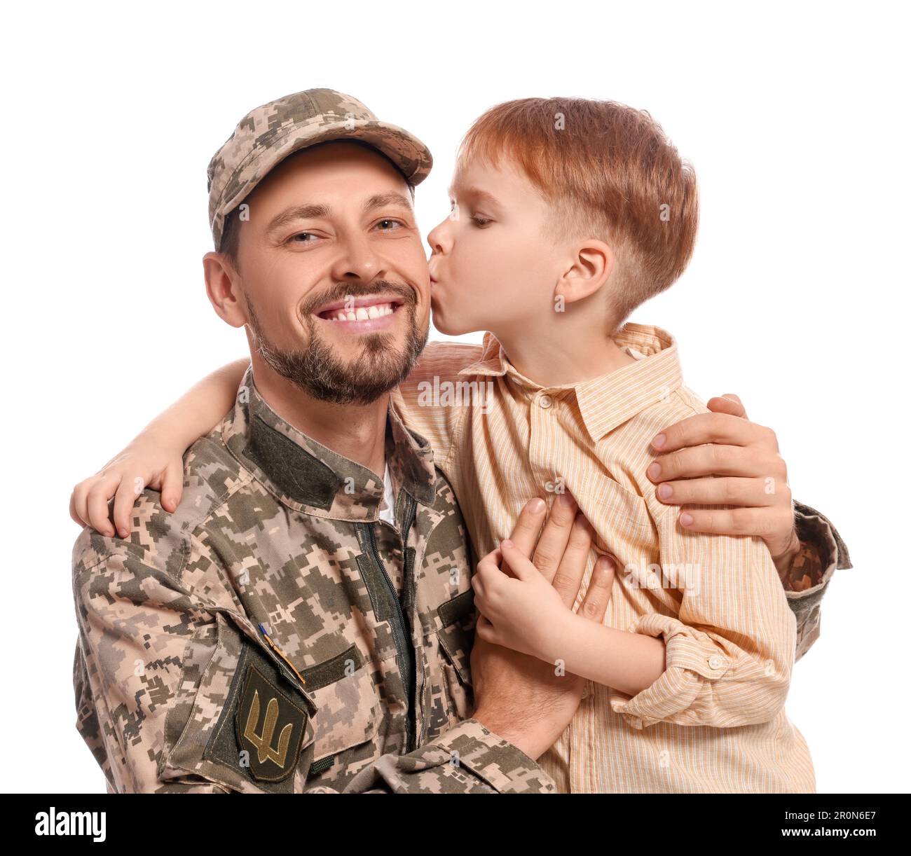 Ukrainian defender in military uniform with his little son on white ...