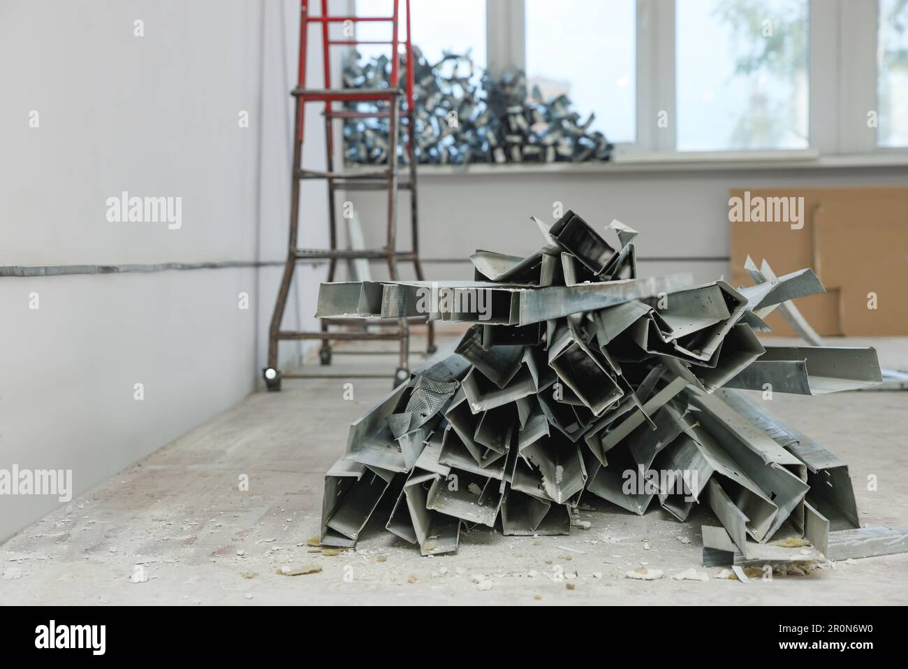 Used building materials in room prepared for renovation Stock Photo - Alamy