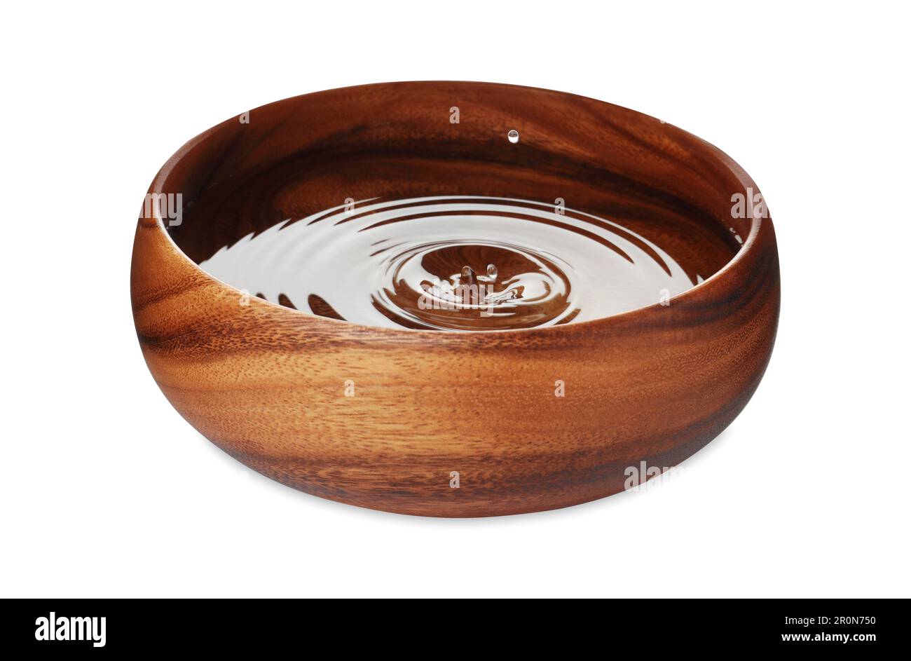 Wooden bowl full of water isolated on white Stock Photo - Alamy