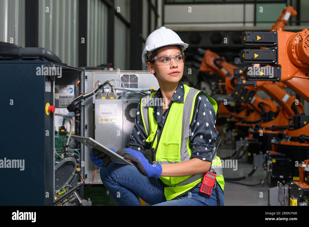 Factory worker managing industrial machine hi-res stock photography and ...