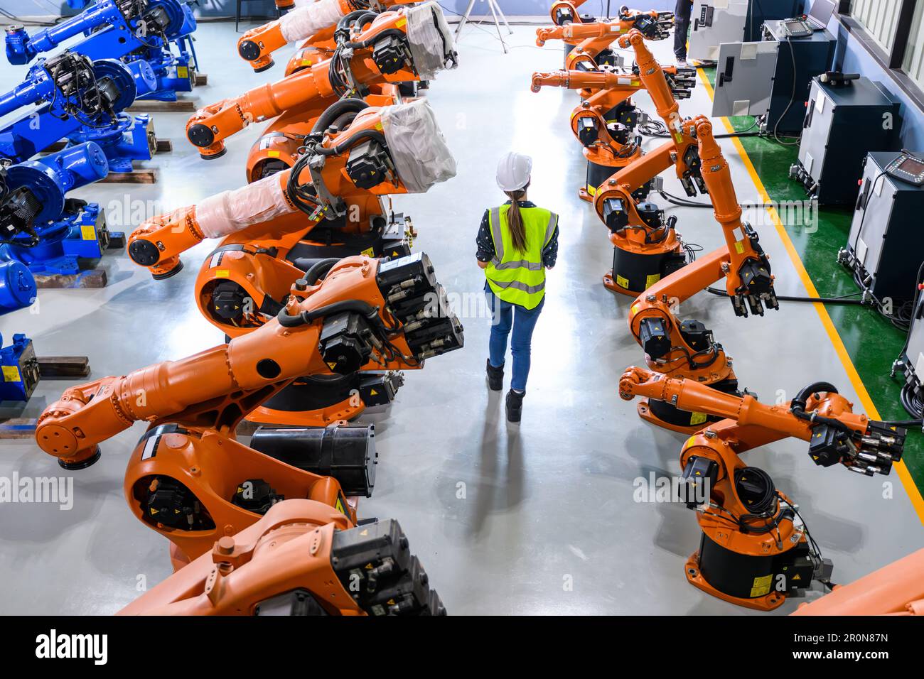 Factory worker managing industrial machine hi-res stock photography and ...