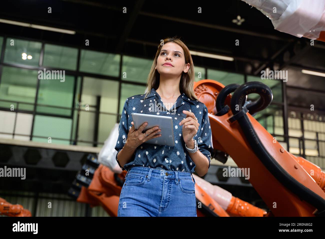 Factory worker managing industrial machine hi-res stock photography and ...