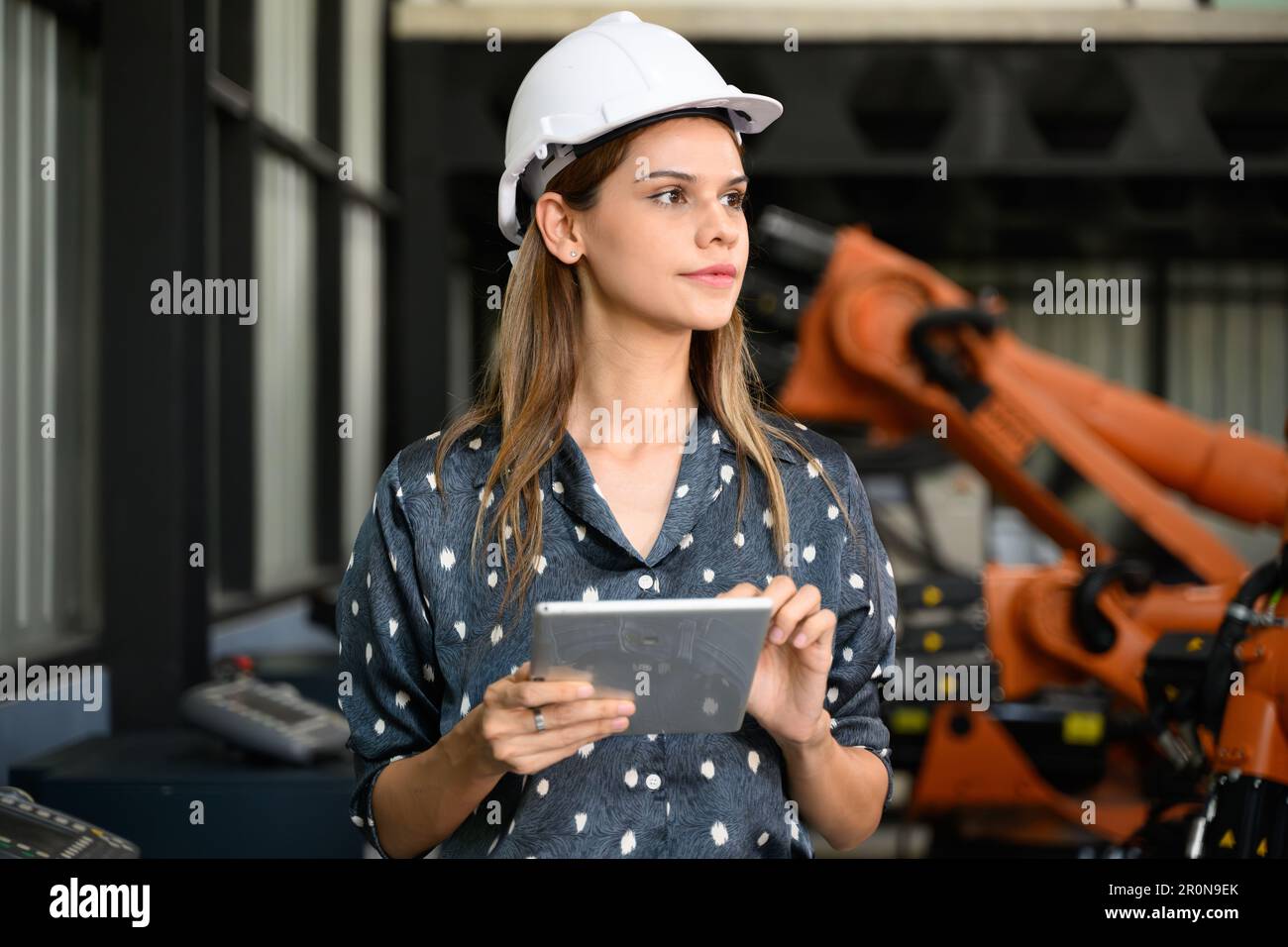 Factory worker managing industrial machine hi-res stock photography and ...