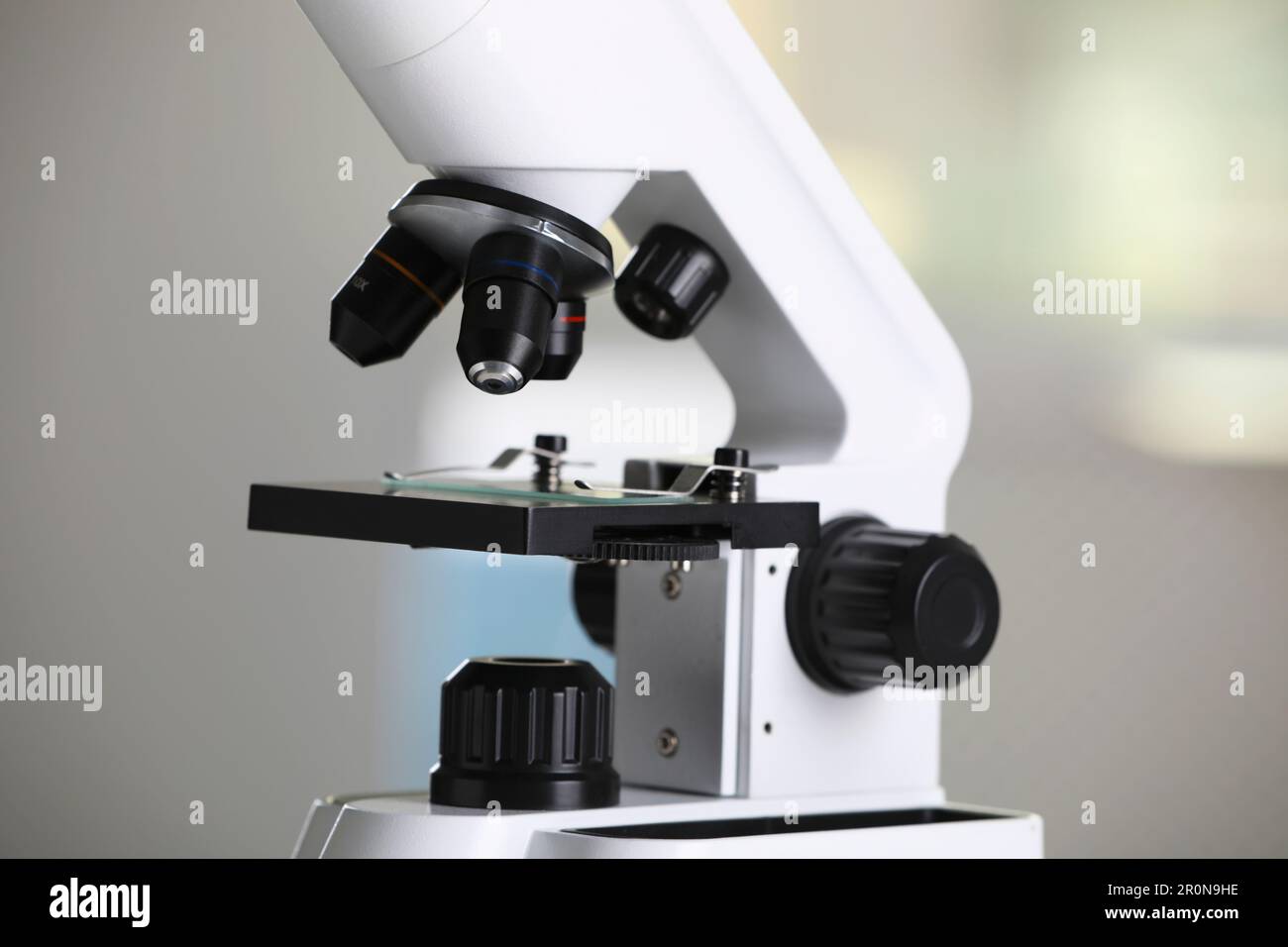 Microscope on blurred background hi-res stock photography and images ...