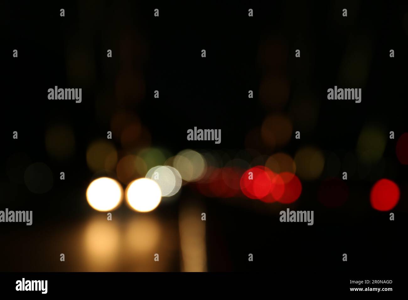 Blurred view of city lights at night. Bokeh effect Stock Photo - Alamy