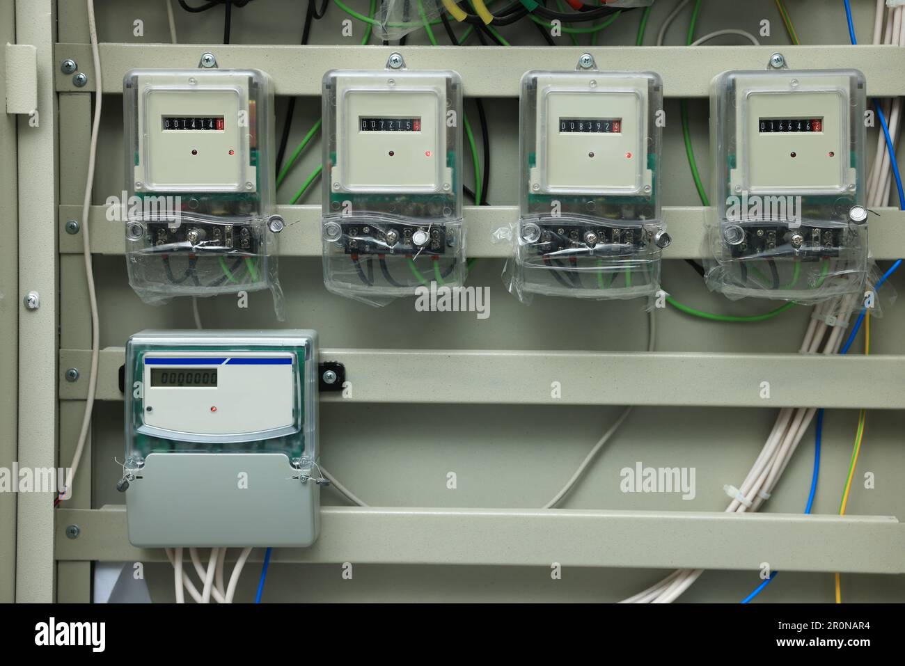 Electric meters and wires in fuse box Stock Photo - Alamy