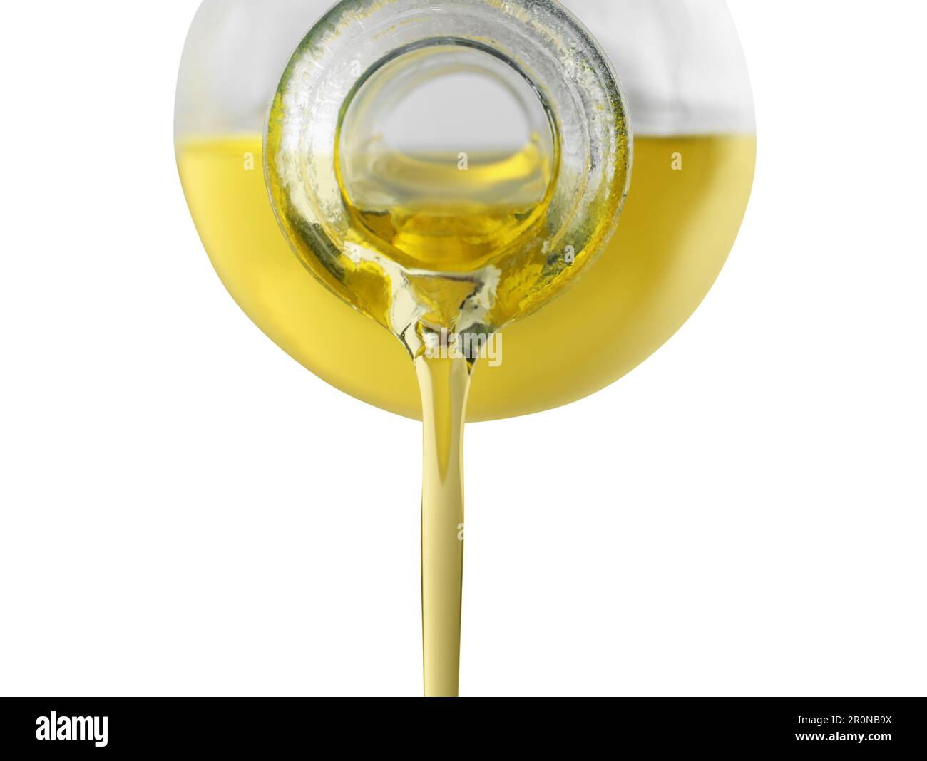Pouring cooking oil from jug on white background, closeup Stock Photo ...