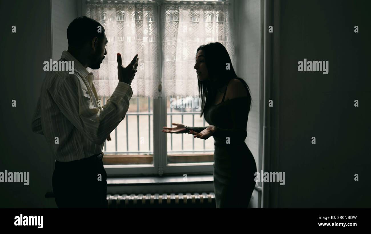 Angry man shouting at woman. Dramatic scene of couple yelling at each ...