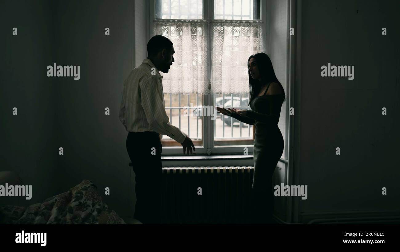 Angry man shouting at woman. Dramatic scene of couple yelling at each ...