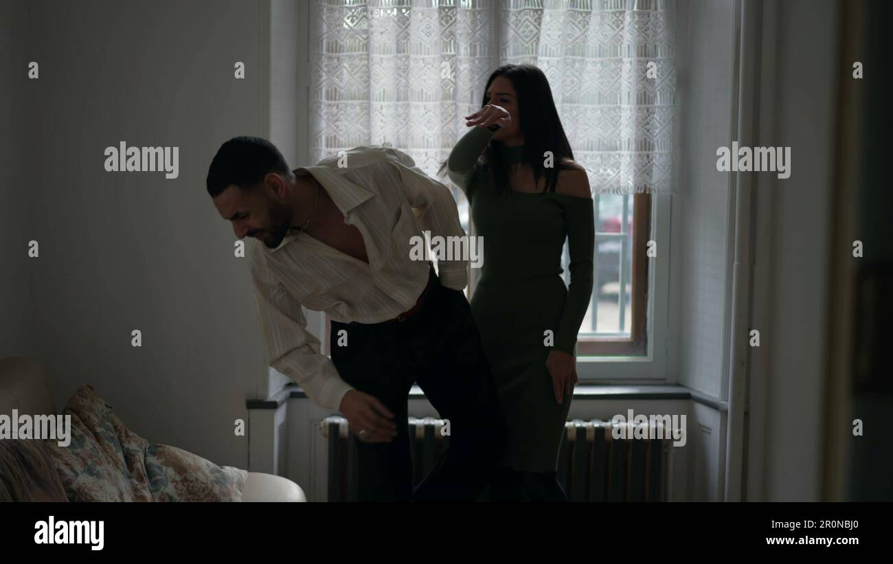 Candid couple fighting, man pointing finger blaming for problems, pushing her away and ...