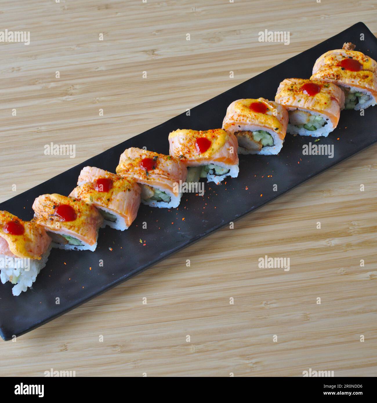 Asian Japanese Food Sushi Spicy Dragon roll Stock Photo - Alamy