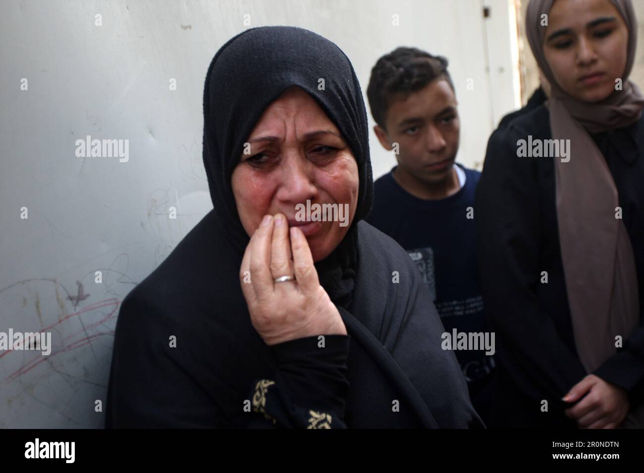 A woman reacts during the funeral of Palestinian Islamic Jihad group ...