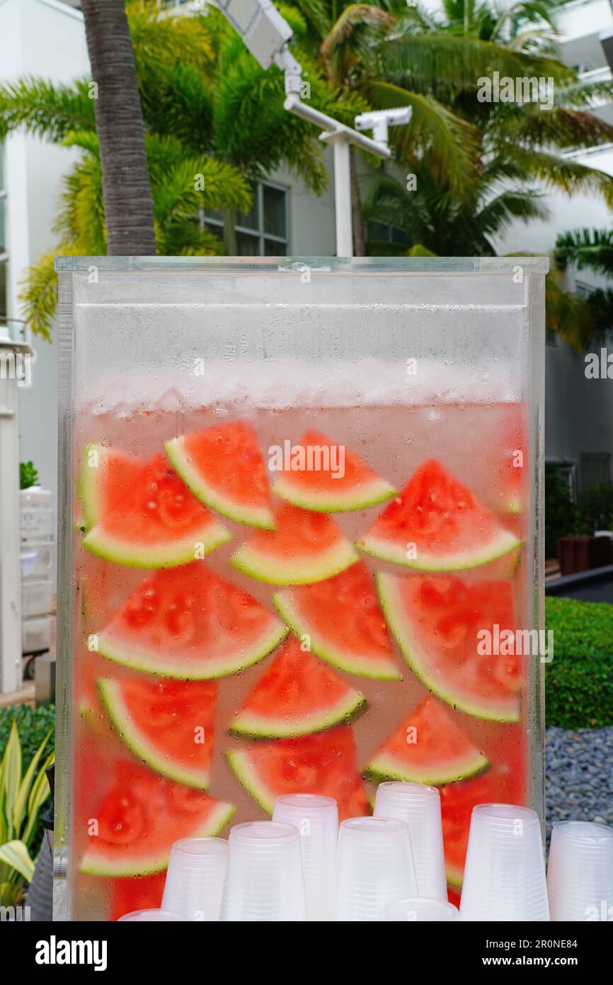 Cold water flavored with watermelon slices Stock Photo - Alamy