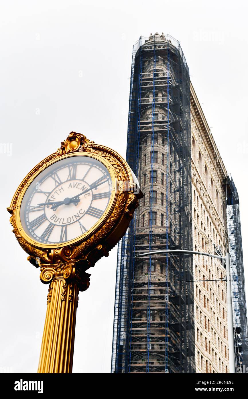 Work in process on Flatiron Building and the cast-iron sidewalk clock ...