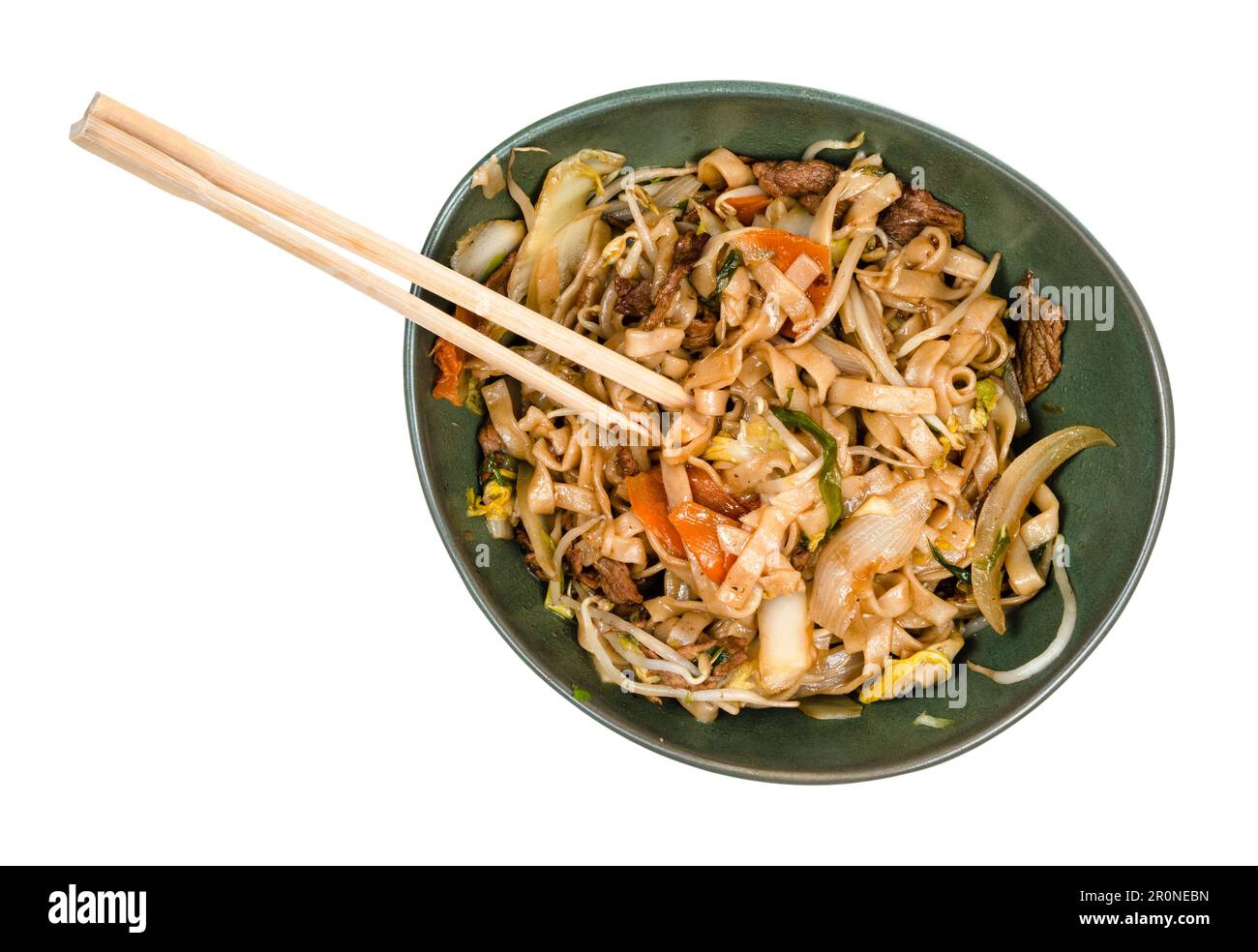 top view of vietnamese Sao Udon fried in wok with vegetables and beef ...