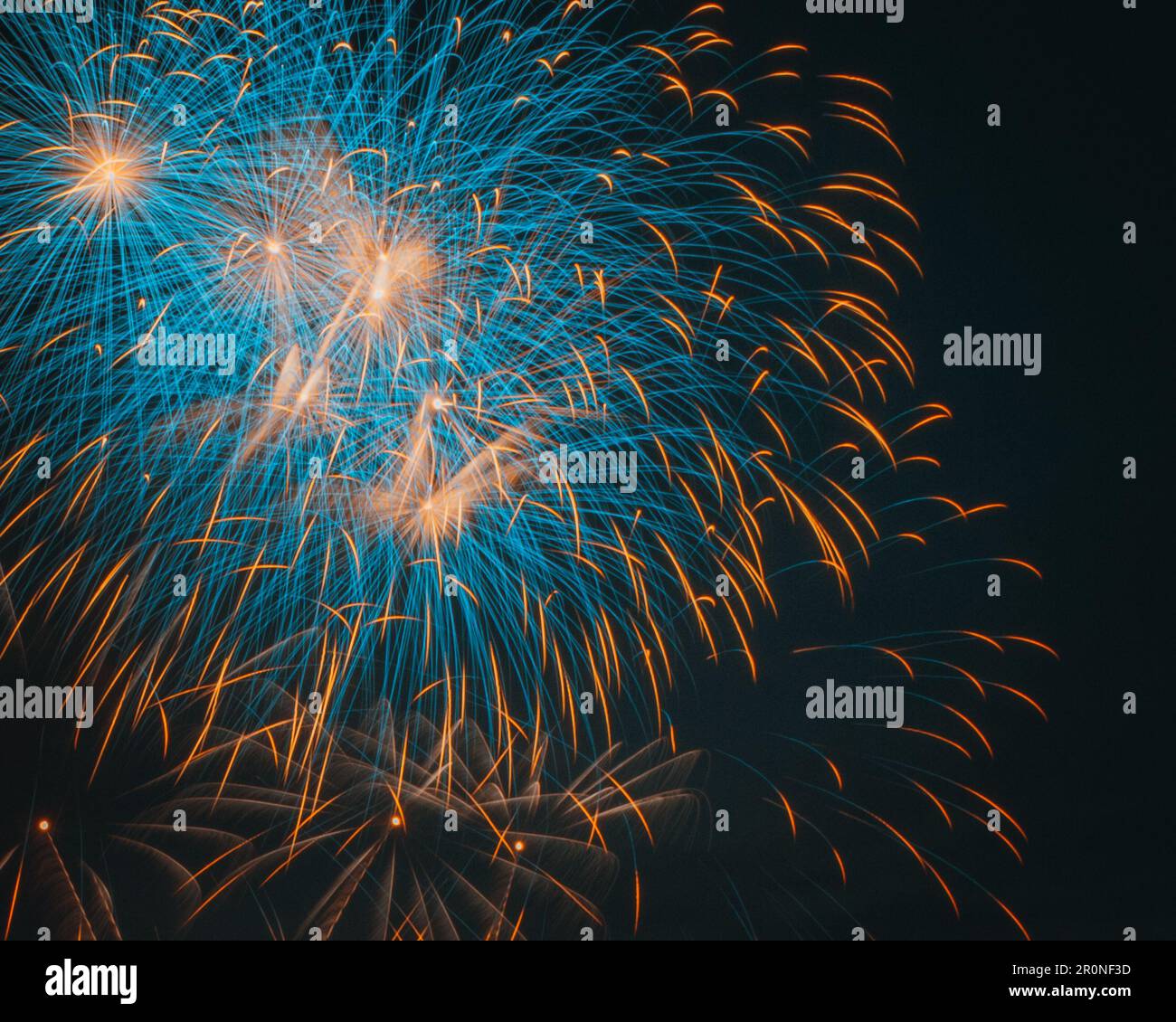 A vibrant nighttime display of fireworks lights up the sky Stock Photo ...