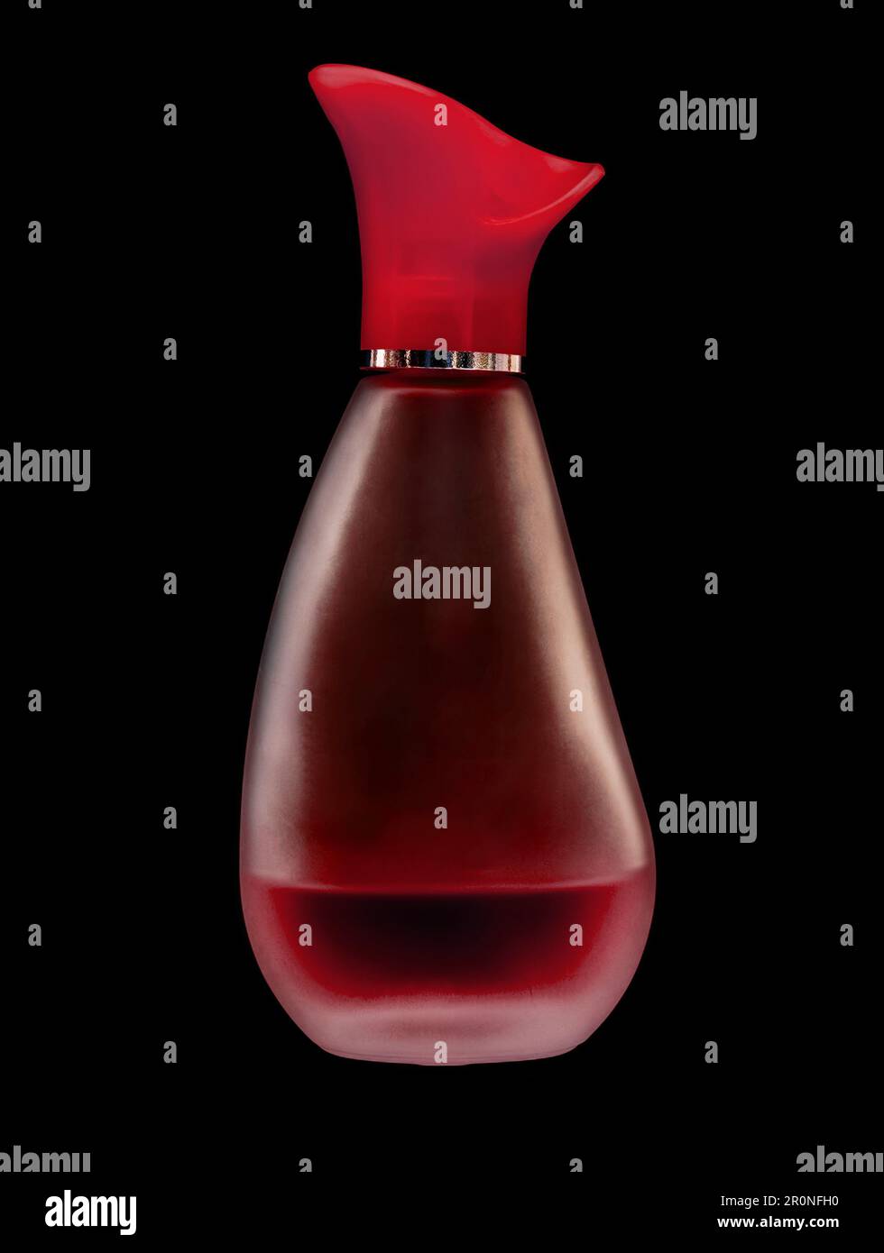 almost empty red perfume bottle Stock Photo - Alamy