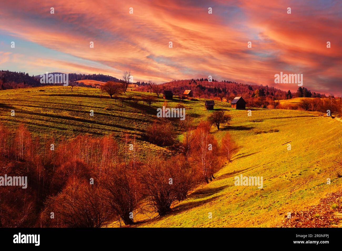 Romanian old sheepfold on the top of the hill in the fall season ...