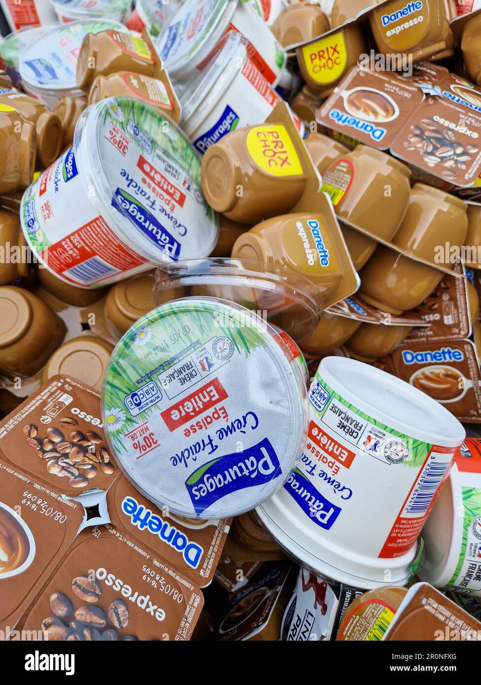 Expired foods in a garbage dumpster, Lyon, France Stock Photo - Alamy