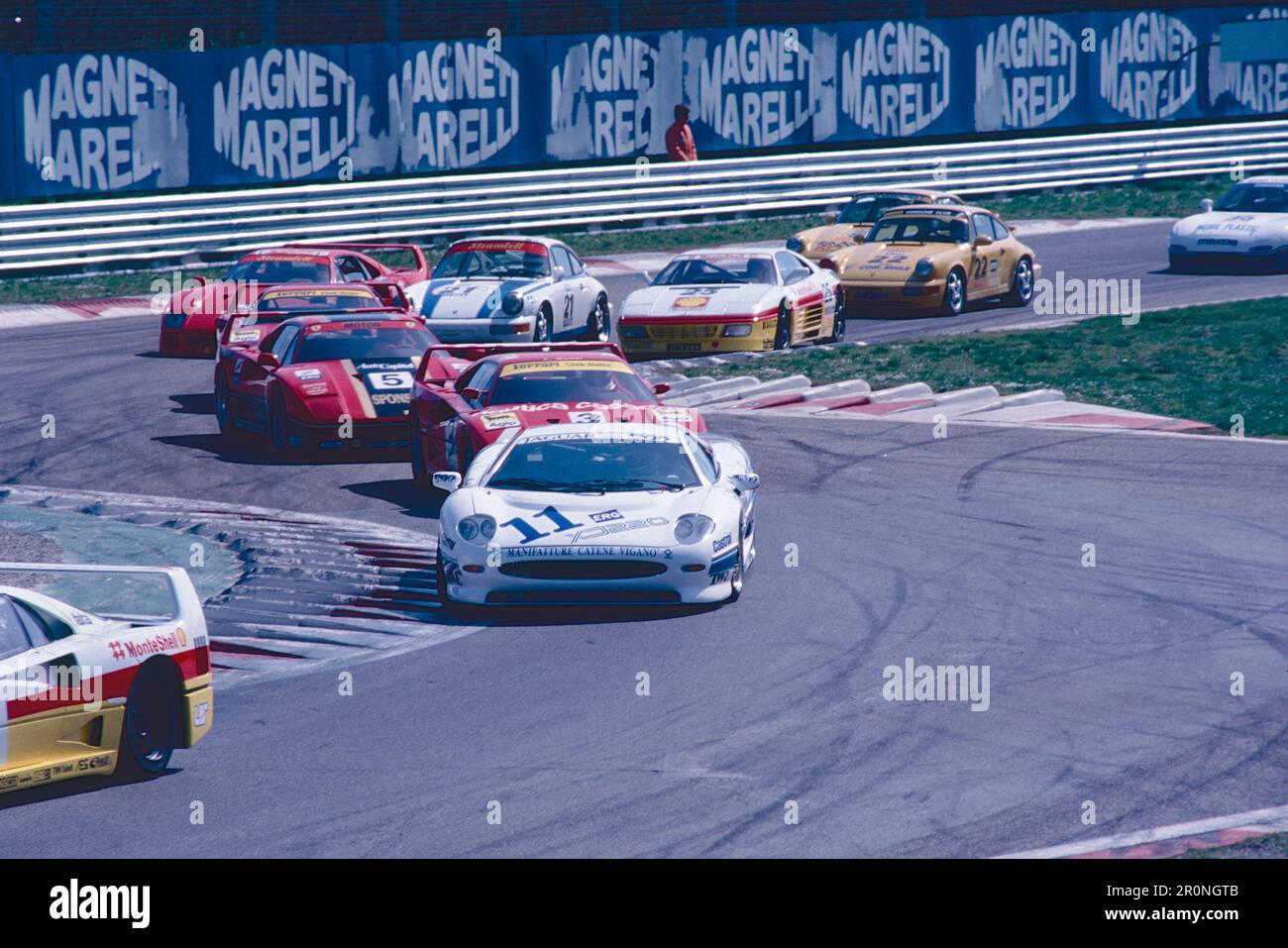 Jaguar XJ220 and Ferrari F40 racing cars at the Italian GT Monza, Italy ...