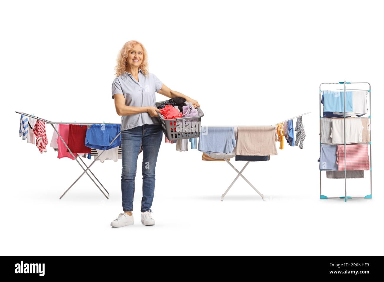 Woman hanging clothes on washing line hi-res stock photography and ...