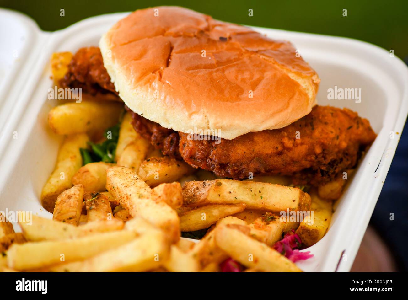 chicken burger and chips in a takeaway tray Stock Photo - Alamy