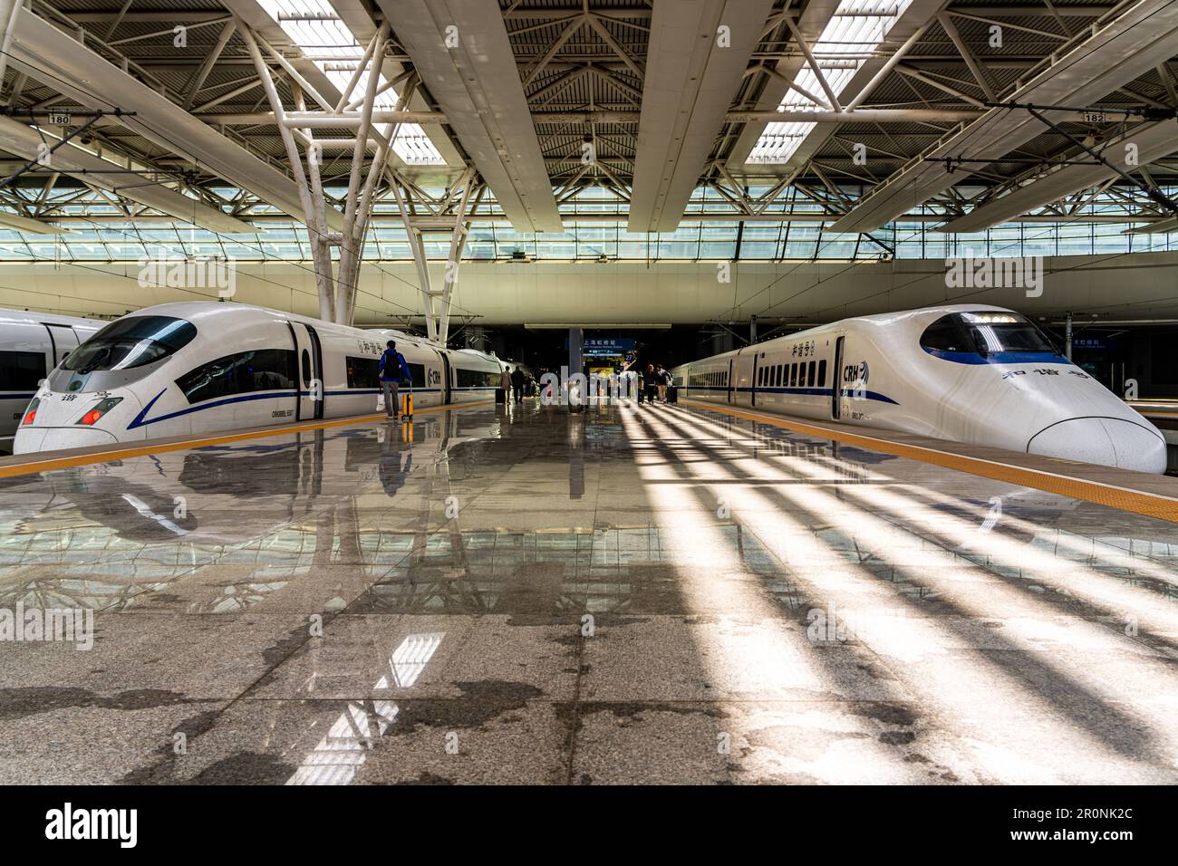 A CRH2B and CRH380BL EMU train at Hongqiao Station, Shanghai, China Stock Photo - Alamy
