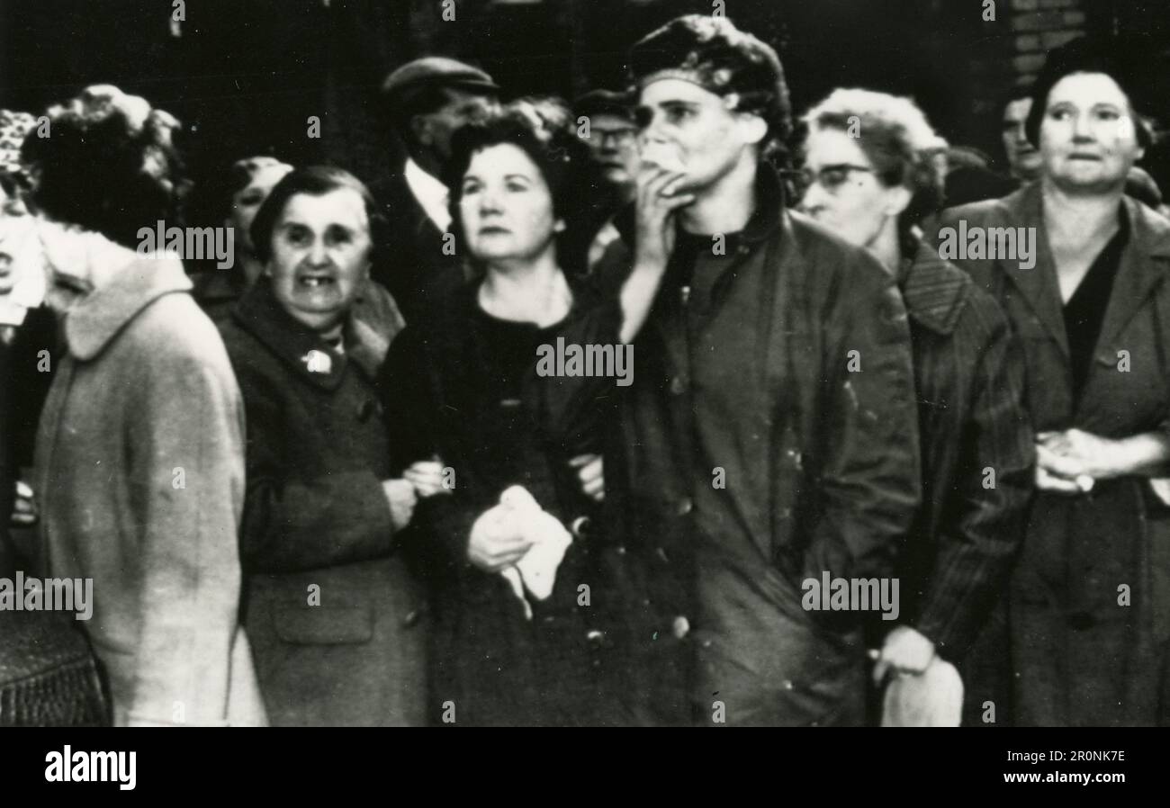Welsh crying mothers waiting the news about their children trapped in ...