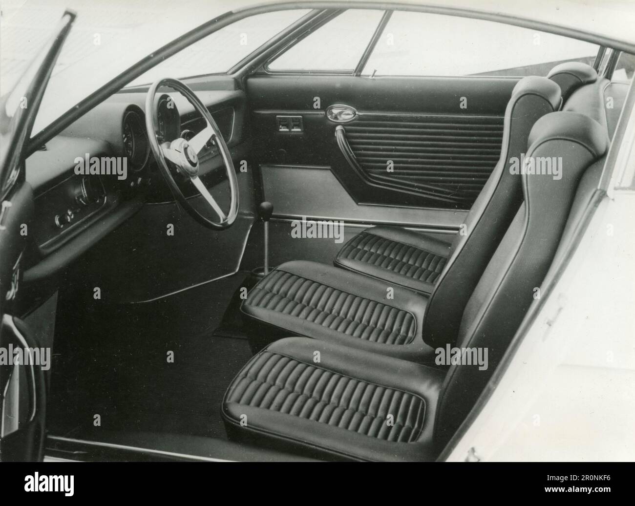 Inside view of the three seats Ferrari 365 P car middle-seat driving ...