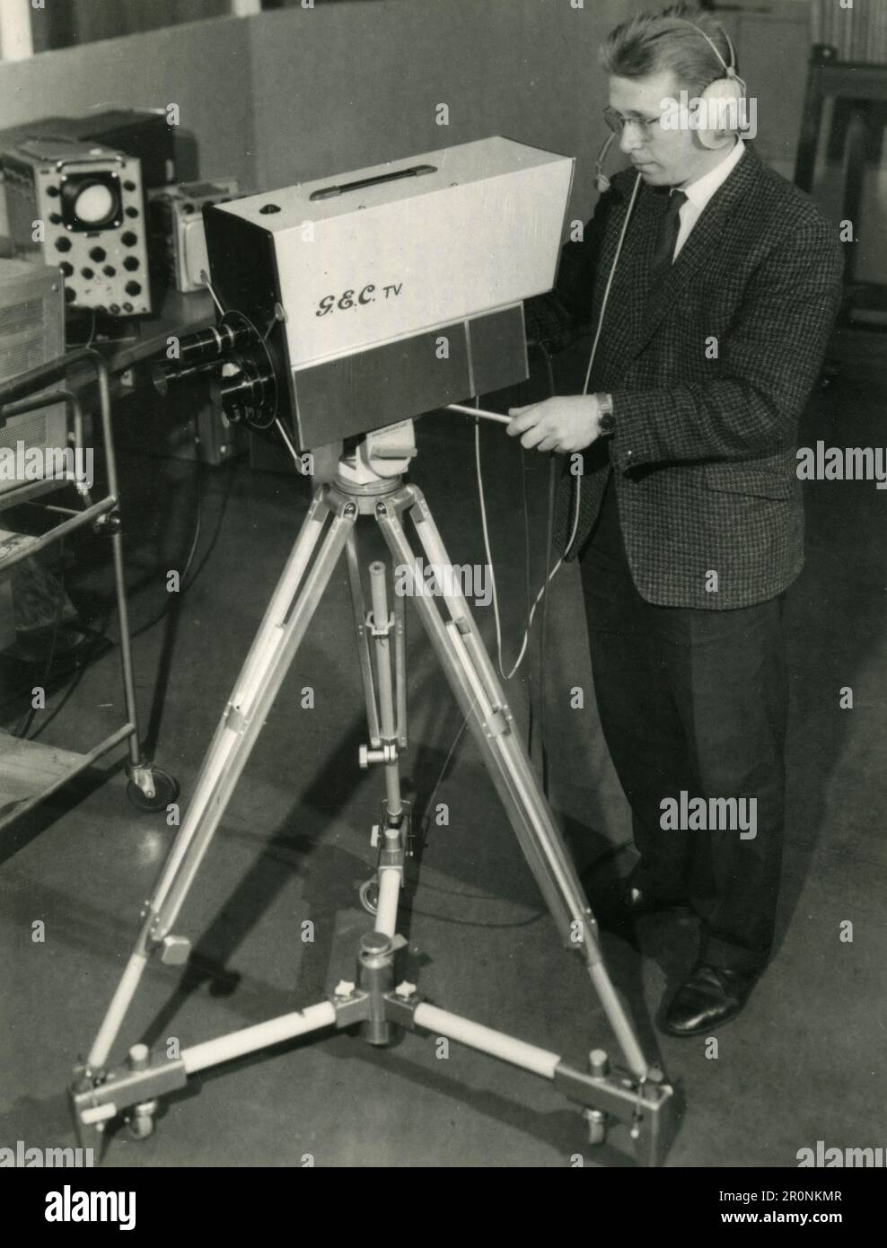 Man operating a TV studio camera by G.E.C. Electronics Ltd, UK 1966 ...