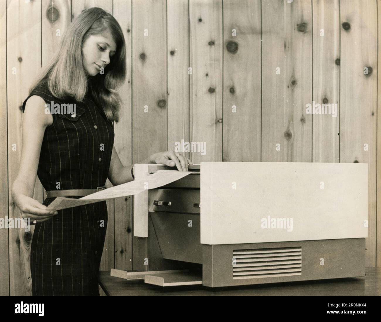 Woman using the electrostatic photocopier ADM 350, UK 1966 Stock Photo ...