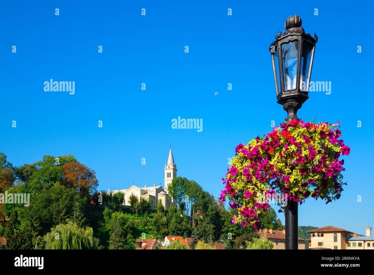 View from the bridge over the Tarnava river to the Citadelkirche ...