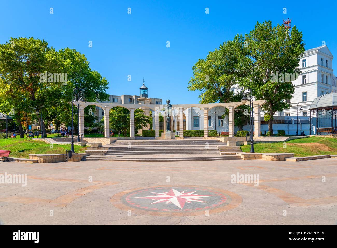 Mihai Eminescu statue with old lighthouse, Constanta, Dobruja, Black ...