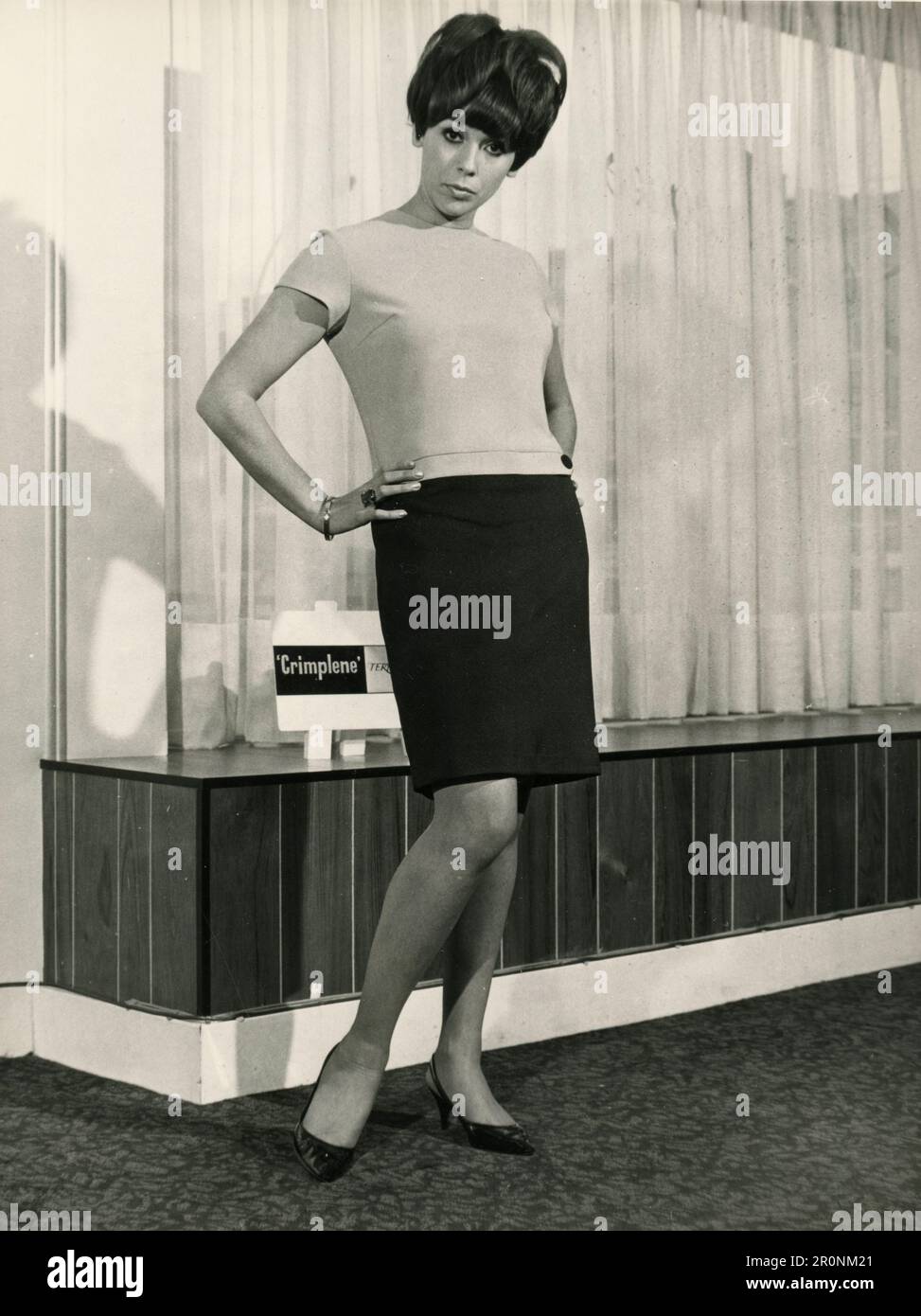 Fashion model wearing a two-tone dress in Crimplene by Gordon LTD ...