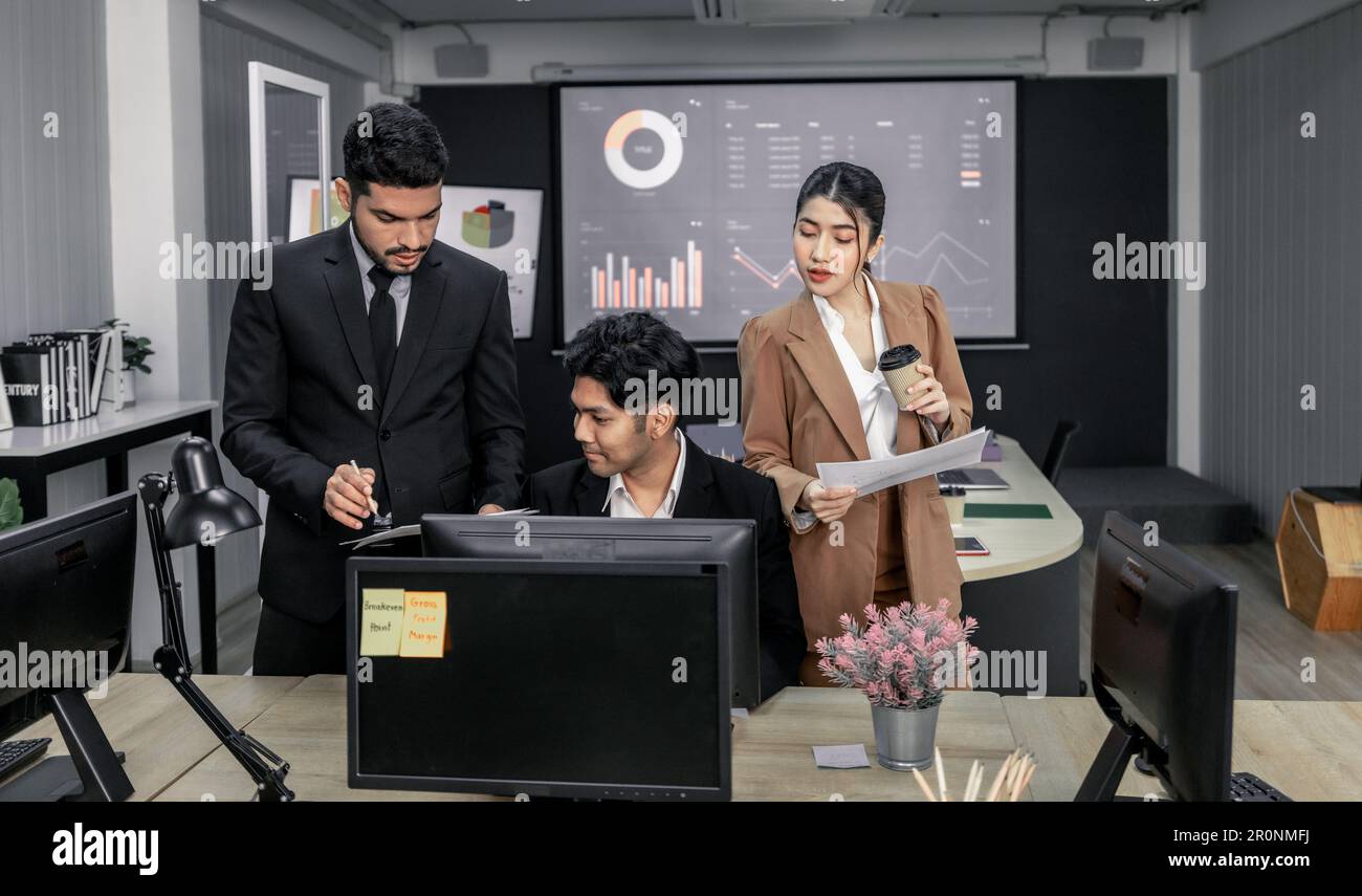 Financial advisors collaborate to assess a company's financial ...