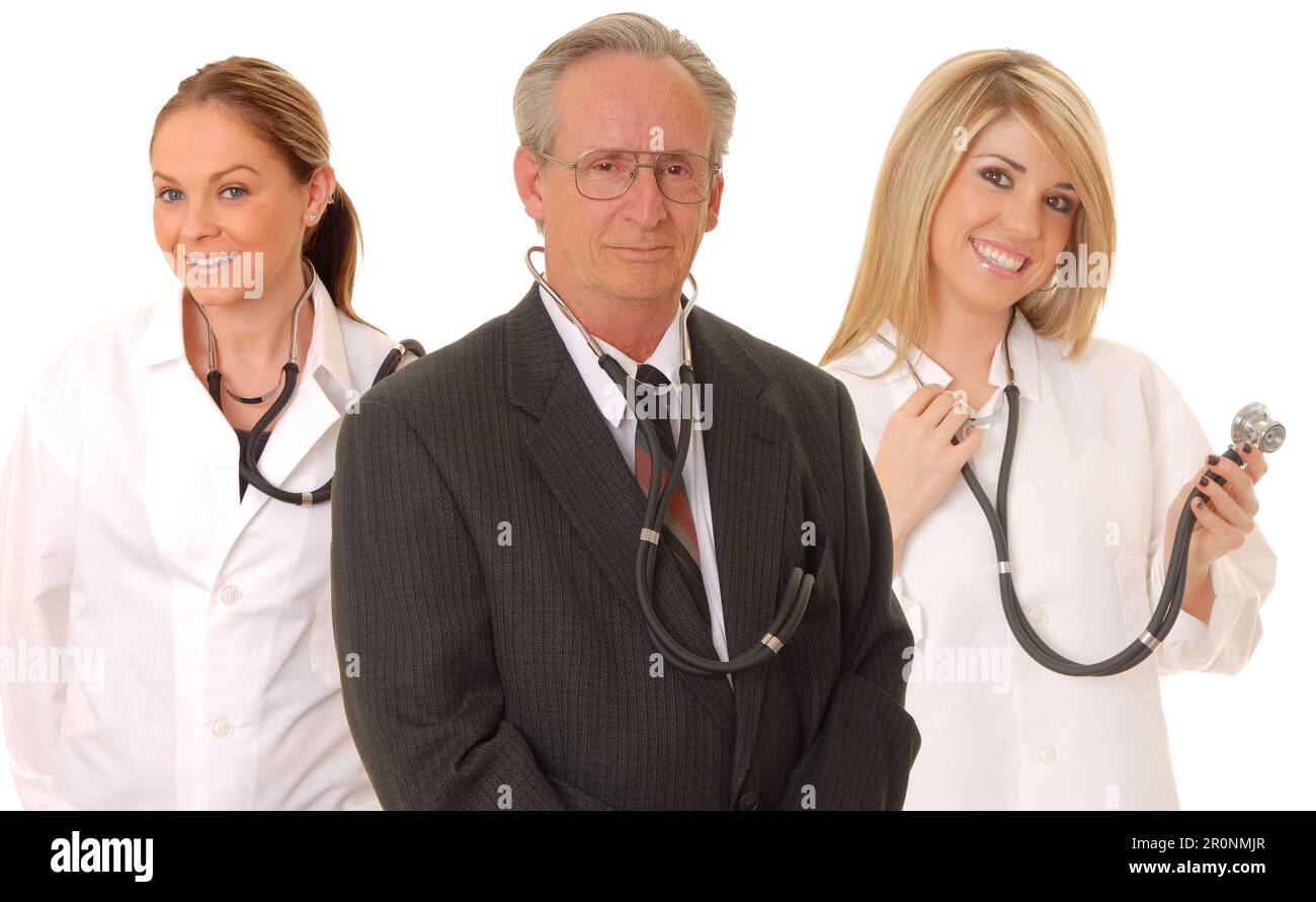 Senior doctor physician and two younger medical team members isolated ...